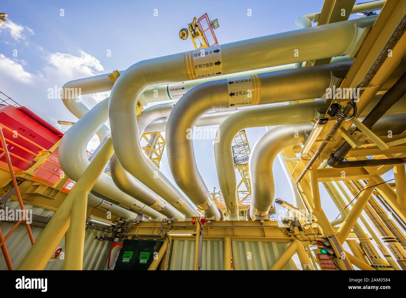 Pipes onboard offshore production platform Stock Photo - Alamy