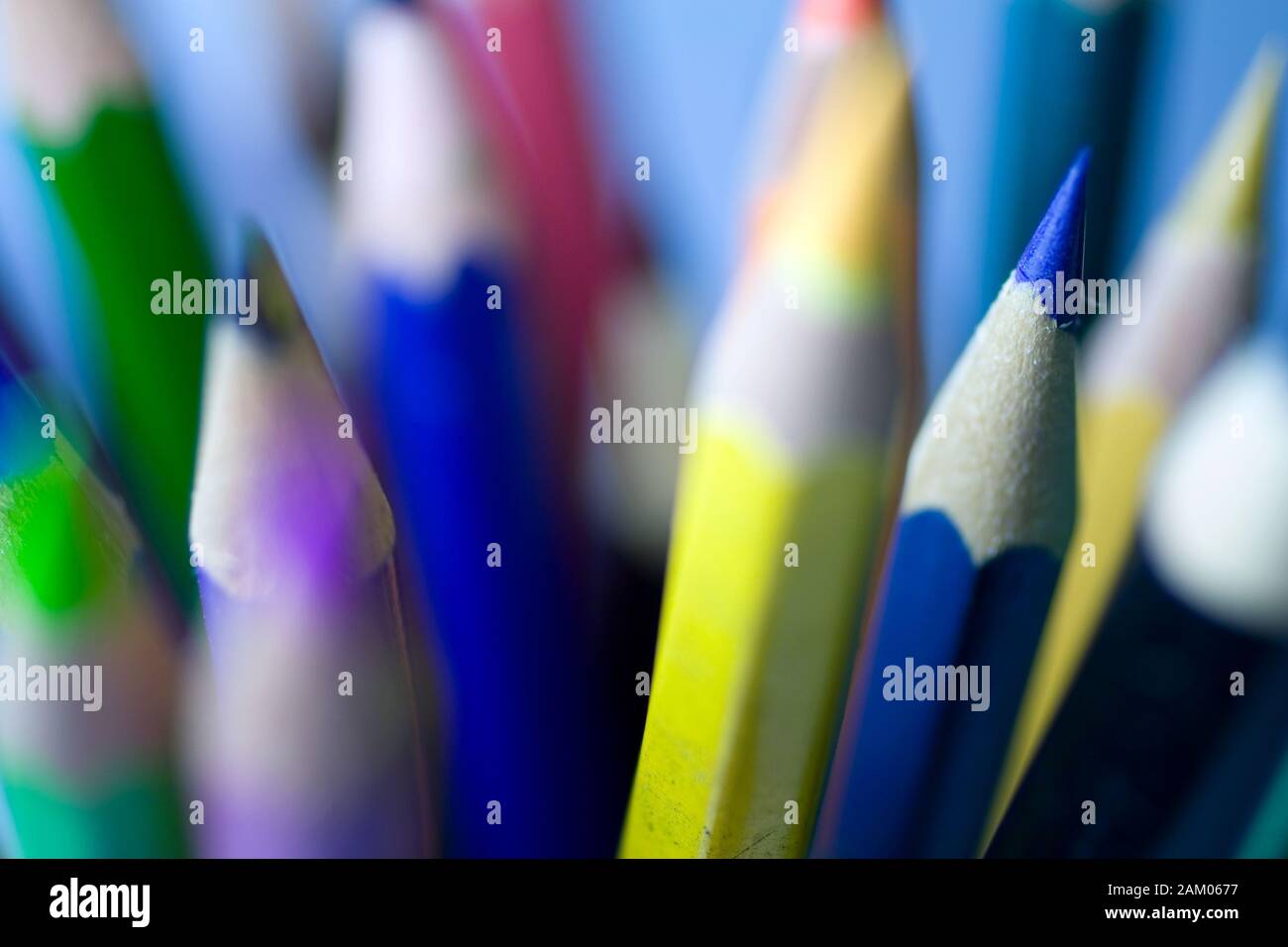 Color pencils with a blurry background Stock Photo - Alamy