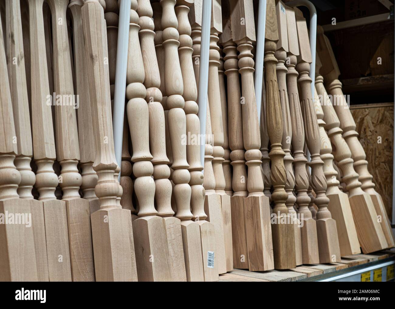 wooden balusters for handrails on a shelf in the store Stock Photo - Alamy