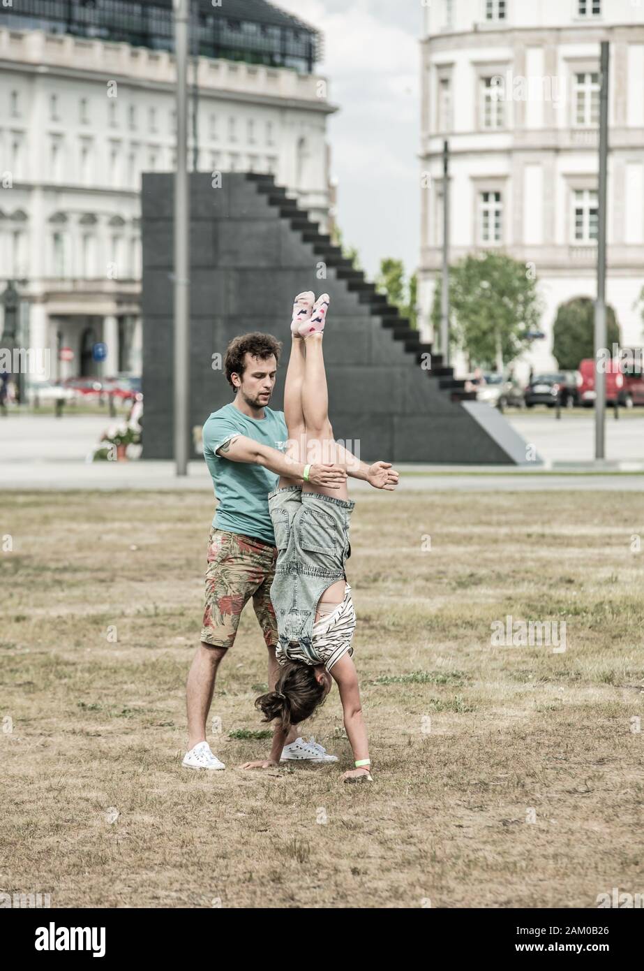 Two people practicing fitness with famous stairs monument in the ...