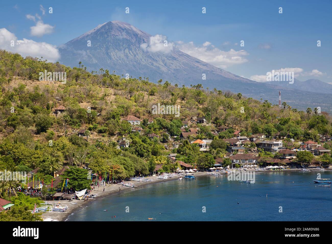 Jemeluk Bay near Amed on the east coast of Bali, with Mount Agung in ...