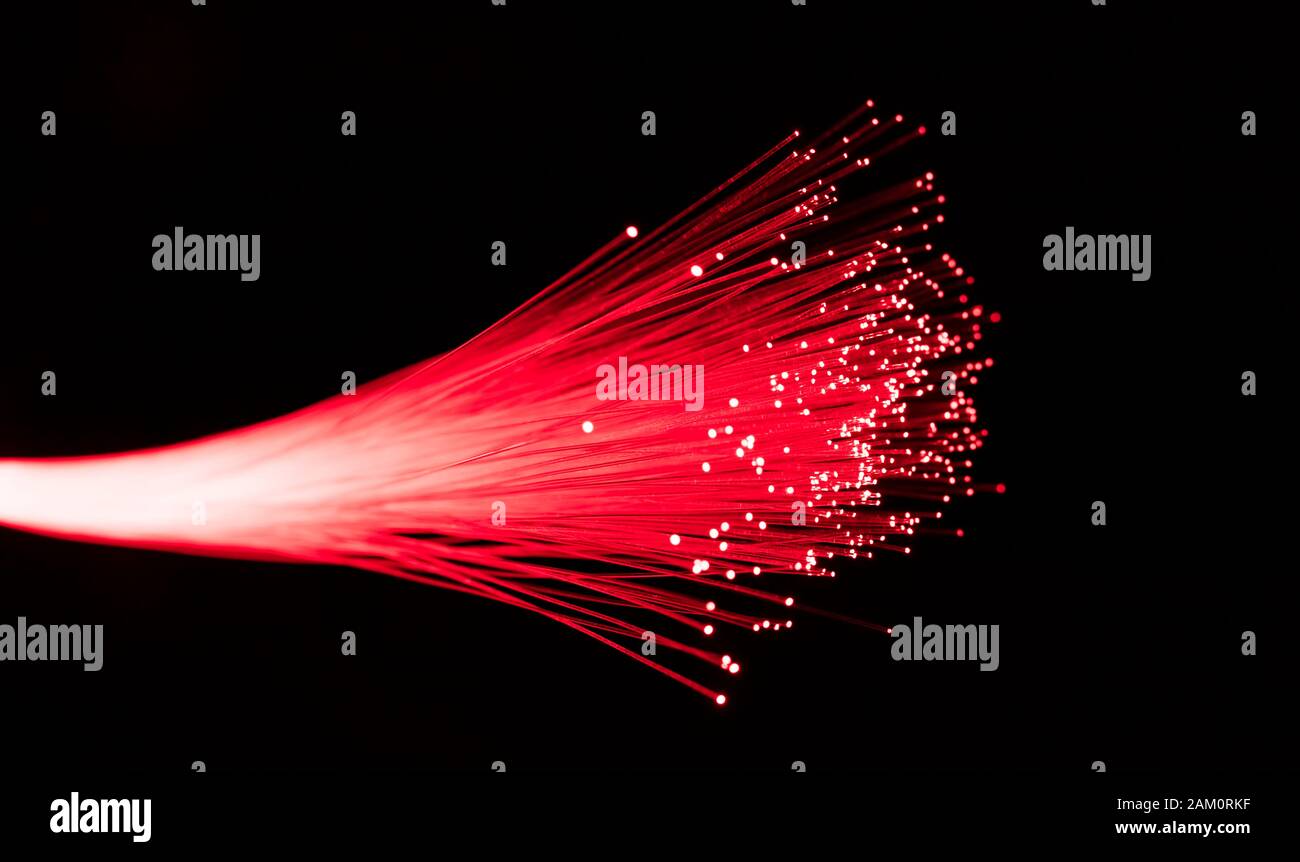 red Fiber optics lights abstract background Stock Photo - Alamy