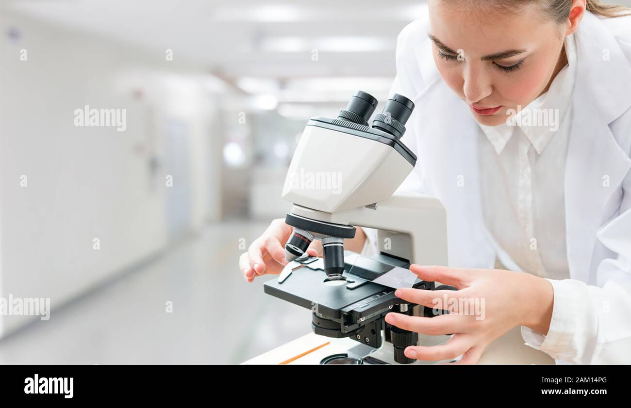 Scientist researcher using microscope in laboratory. Medical healthcare ...