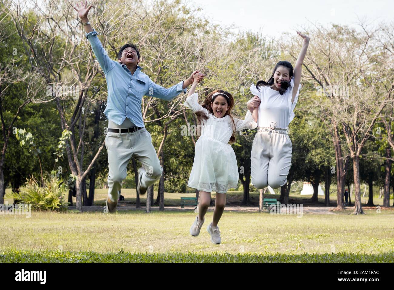 Mother and daughter jumping garden hi-res stock photography and images ...