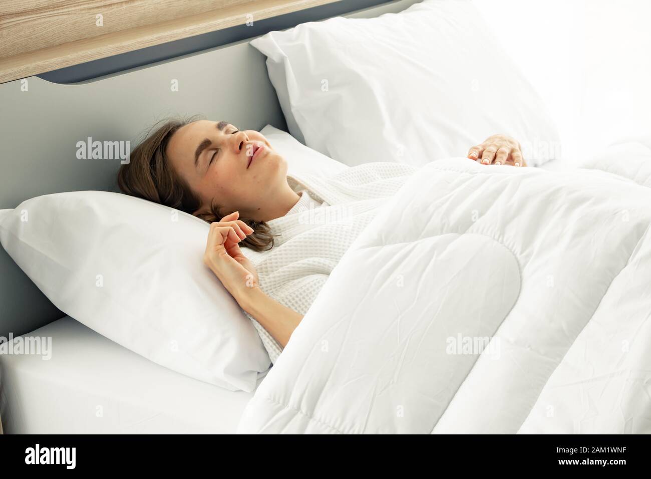 Beautiful woman sleep in the bed at home. Concept relax in the bedroom ...