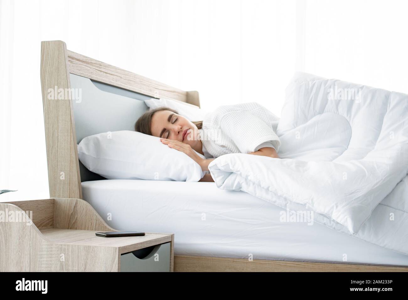 Beautiful women sleep in the bed at home. Concept relax in the bedroom ...