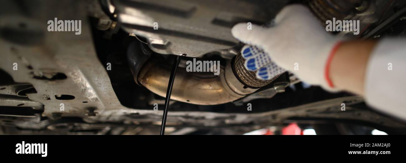 Black jet of used engine oil drains from the engine Stock Photo - Alamy