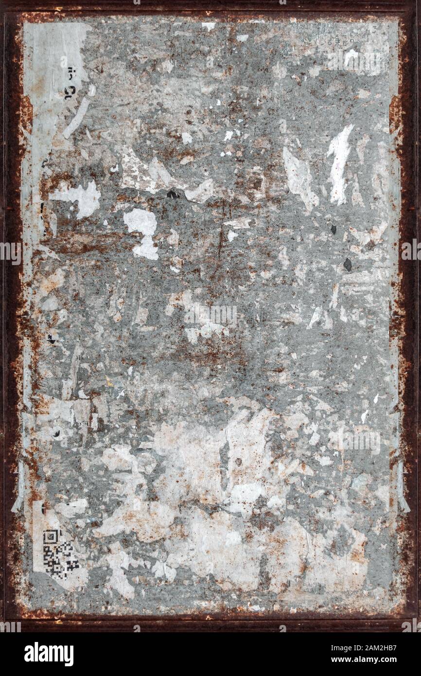 Texture of a grungy wall with torn posters and rusty frame. Ideal for ...