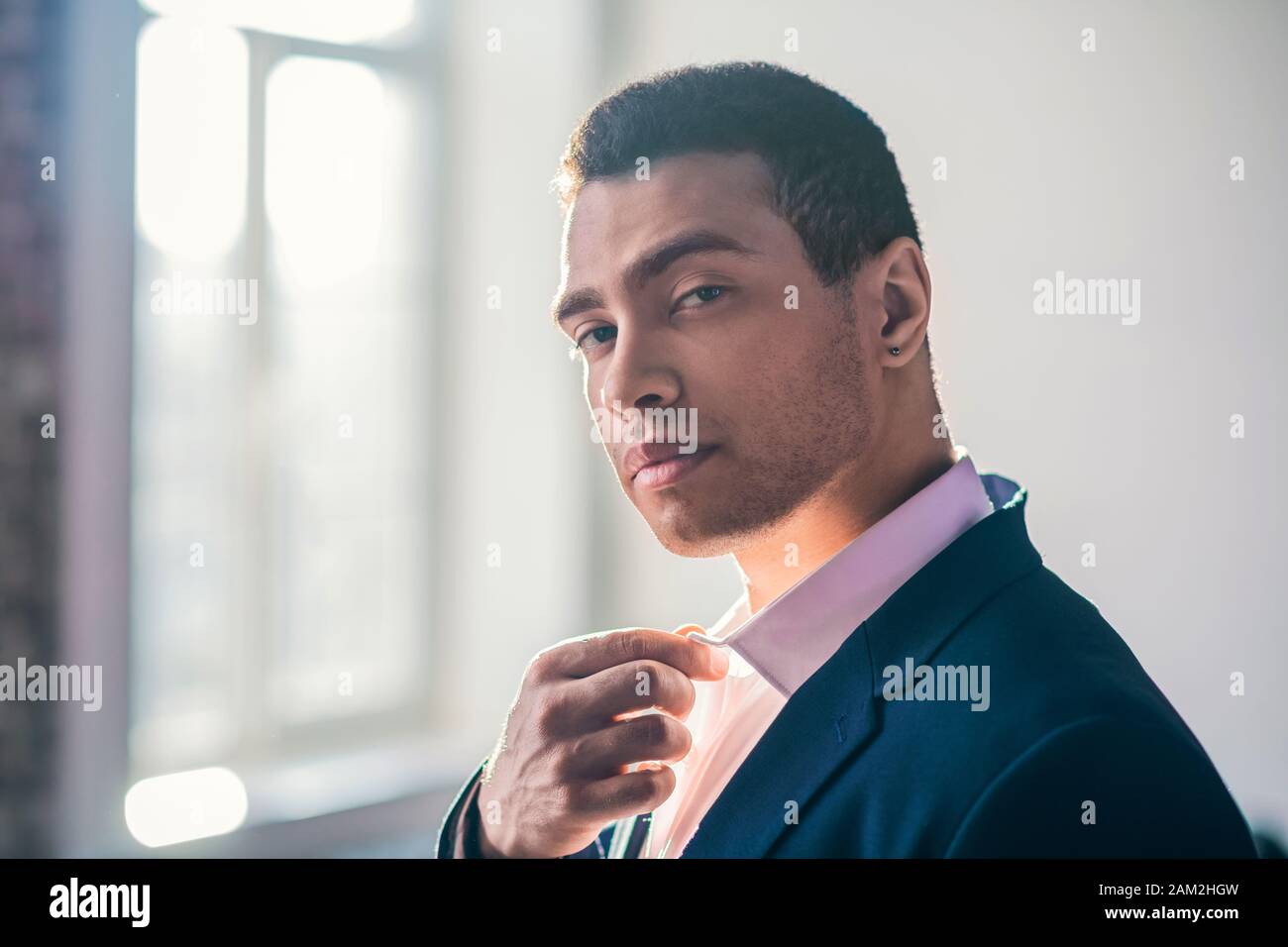 Good looking young confident man hi-res stock photography and images ...
