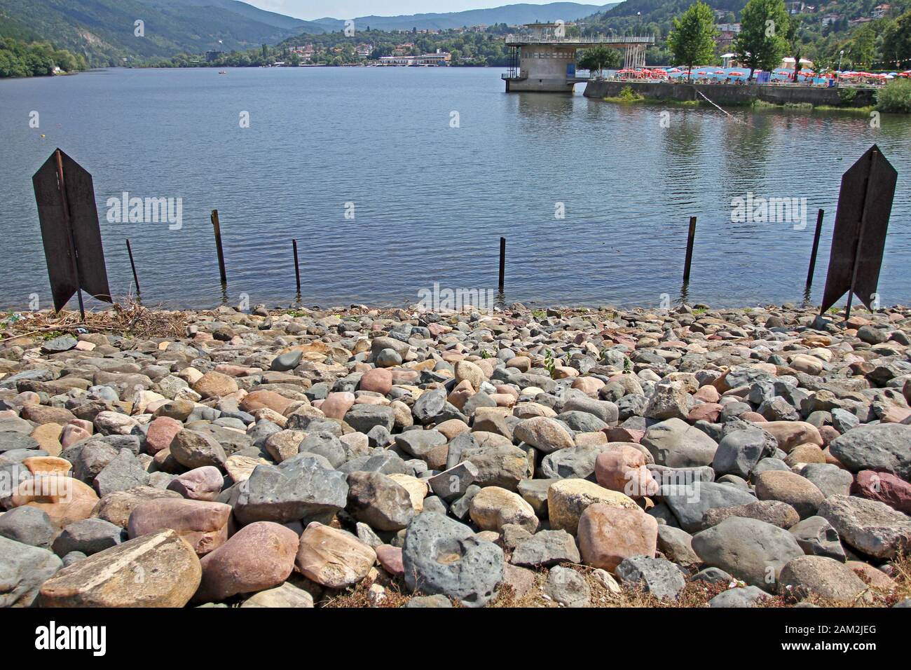 Dike of iskar dam in Bulgaria. Shore of dam Stock Photo - Alamy
