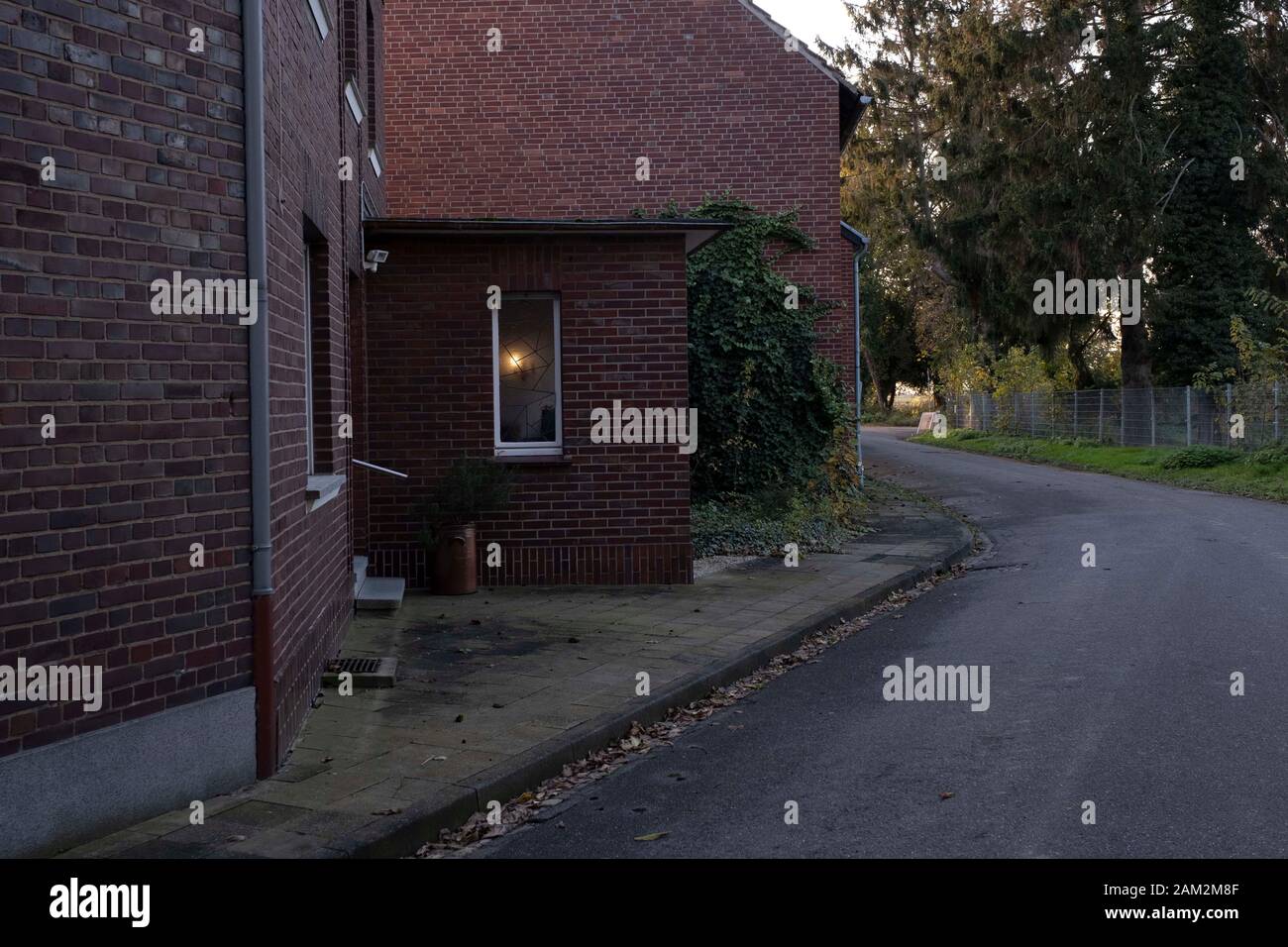 Lights seen through window of house in town abandoned for coal mining ...