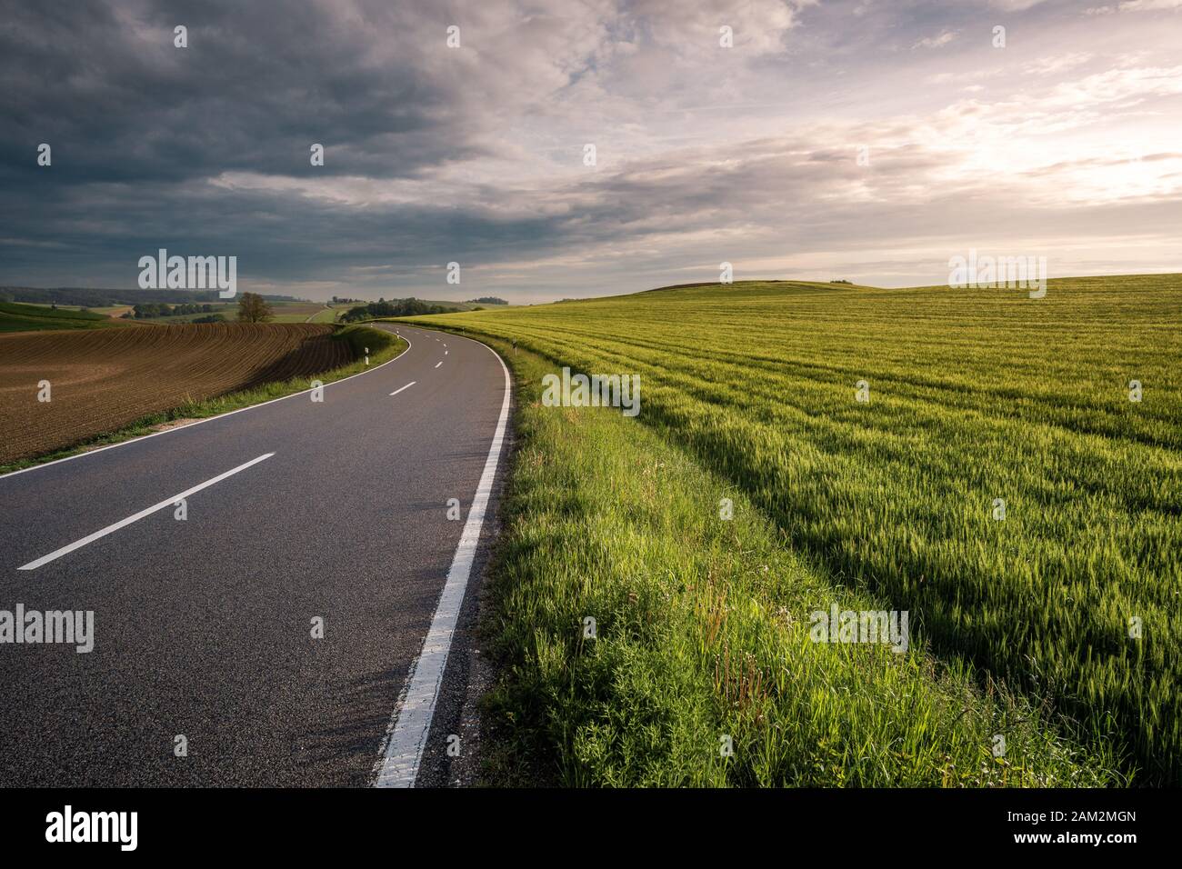 roadtrip with a dramatic sky and unknown destination Stock Photo - Alamy