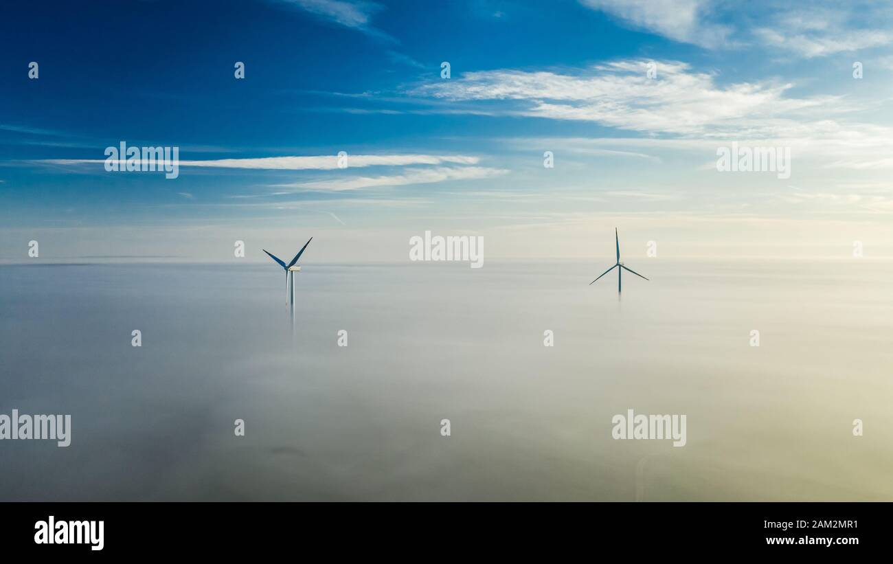Aerial view foggy field wind turbines hi-res stock photography and ...