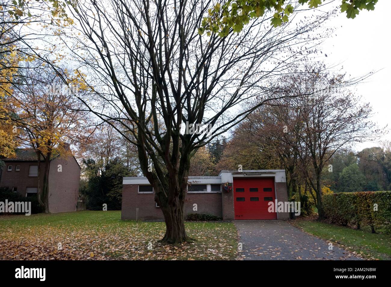 Walkway to garage red door in town being cleared for coal mining ...