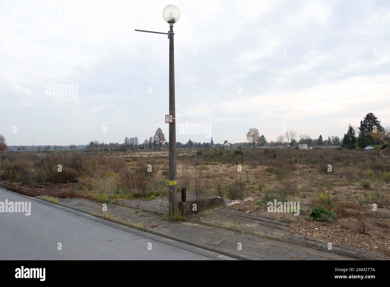 Lone lamp post by roadside in abandoned coal mining town of Mannheim ...