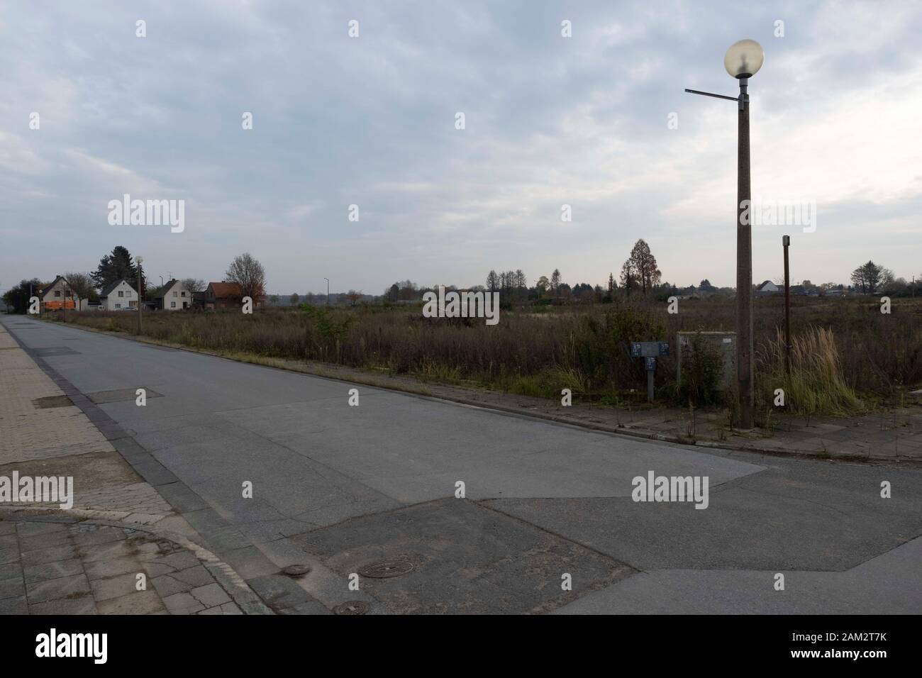 Lone lamp post by roadside in abandoned coal mining town of Mannheim ...