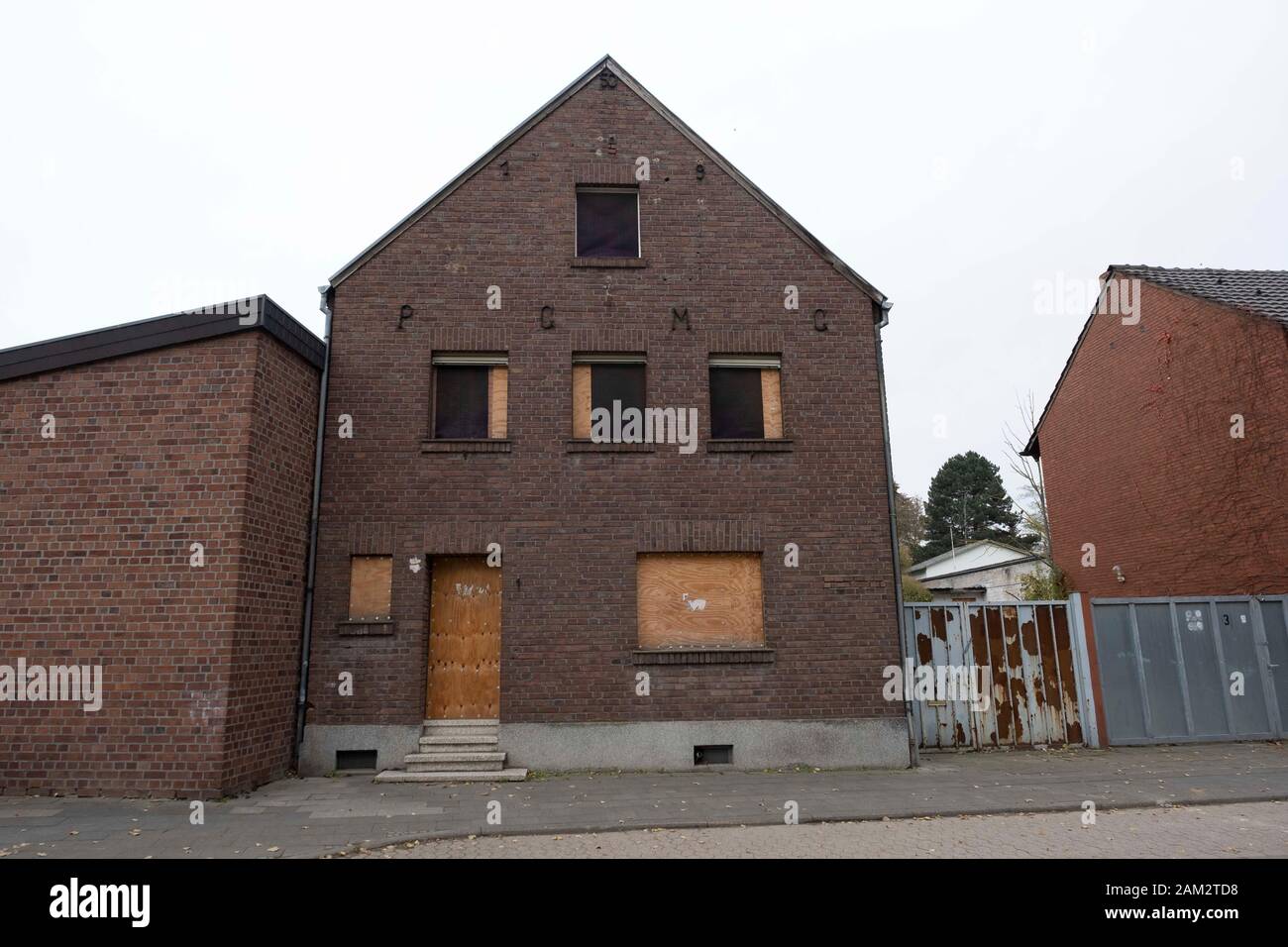 Red brick house in town abandoned for coal mining, Mannheim, Germany ...