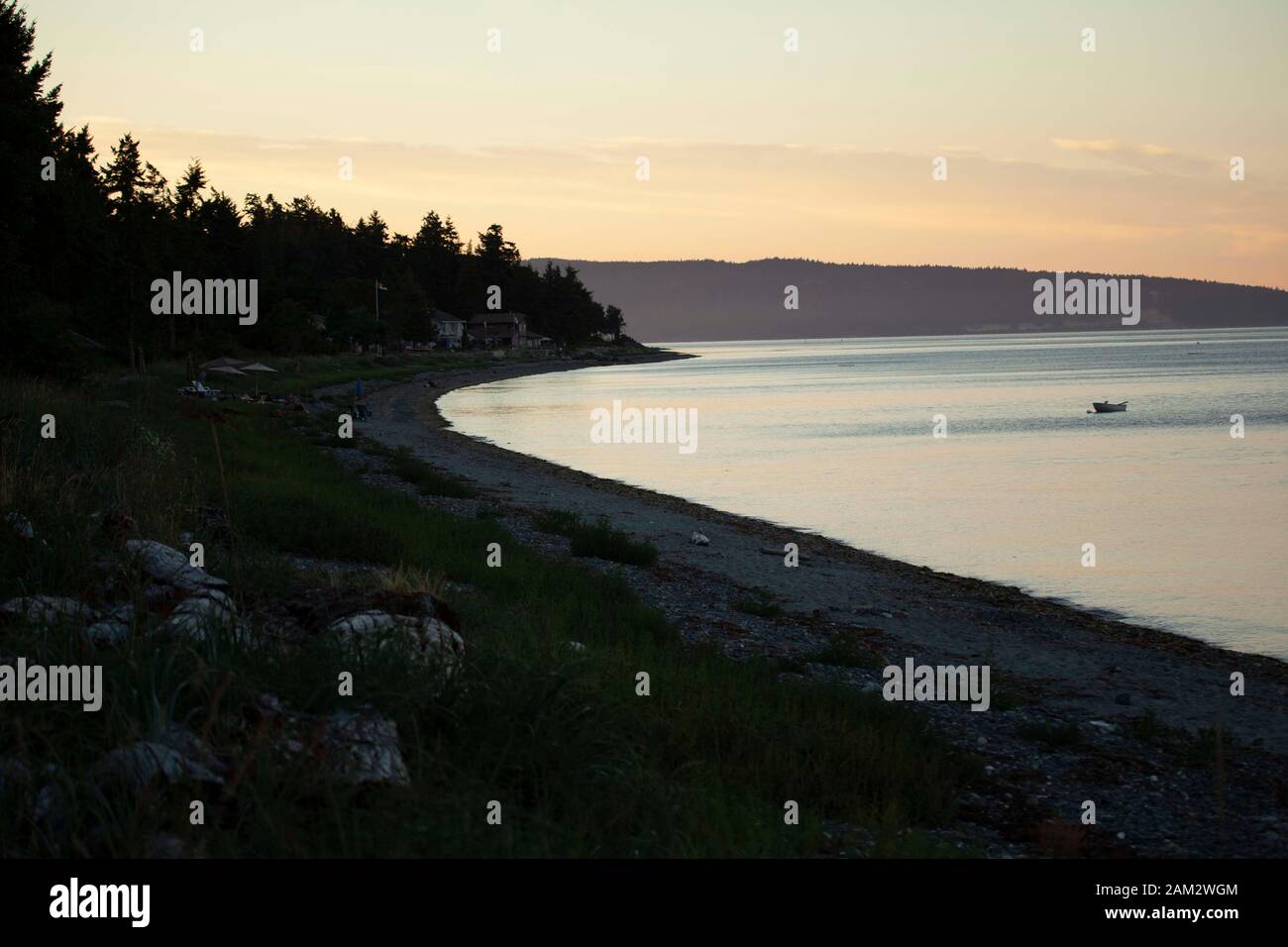 Idyllic coast line around calm bay, Vancouver Island, British Columbia ...