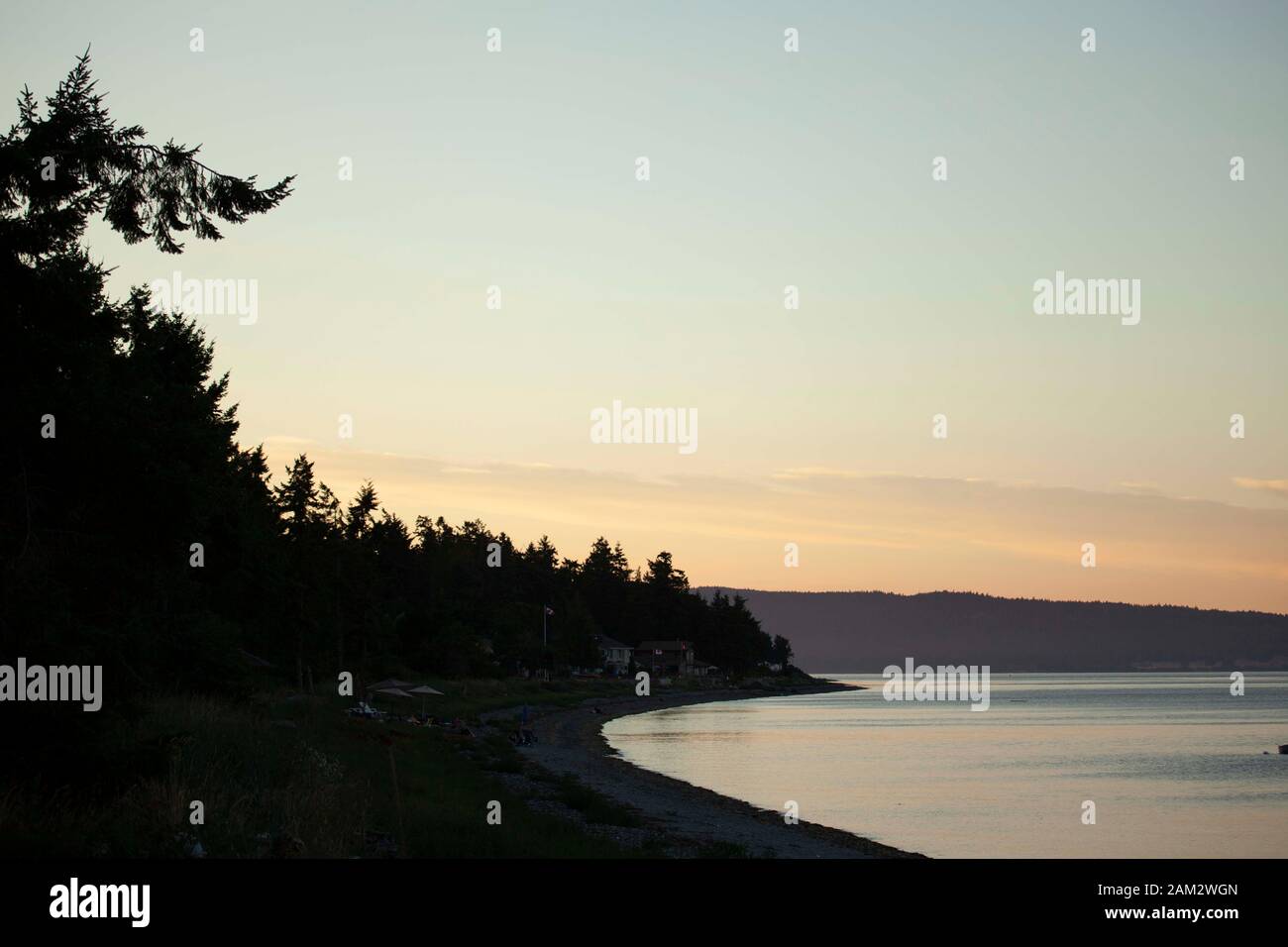Idyllic coast line around calm bay, Vancouver Island, British Columbia ...