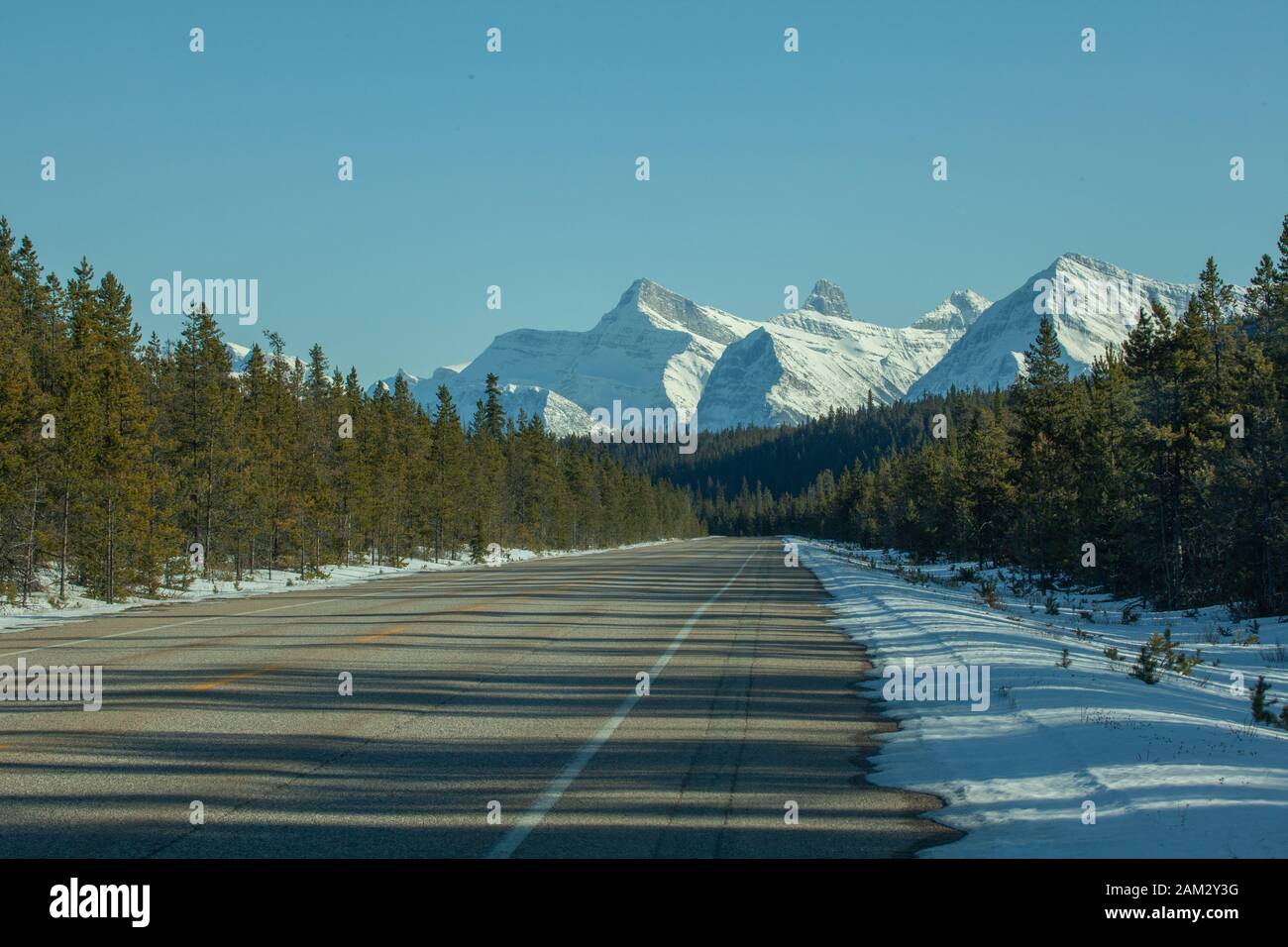 Remote highway in snowy mountain hi-res stock photography and images ...
