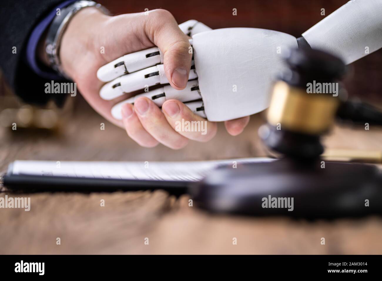 Robot Shaking Hands With Judge Near Gavel On Wooden Desk Stock Photo ...