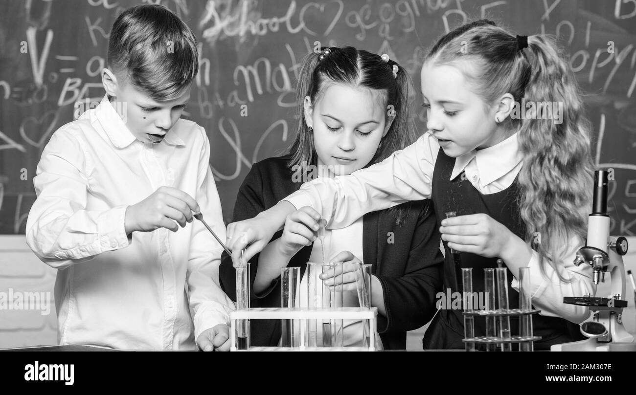 Little children. Science. biology experiments with microscope. Lab ...