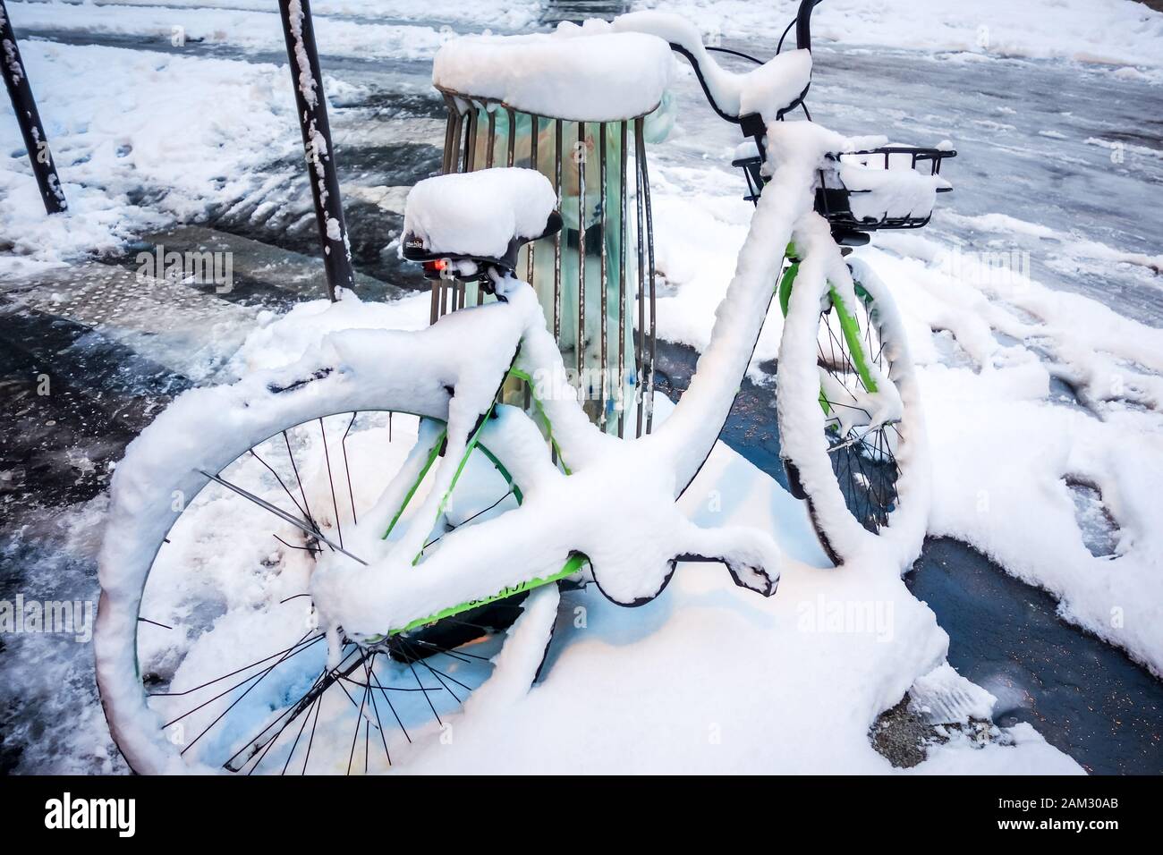 Bike under snow hi-res stock photography and images - Alamy