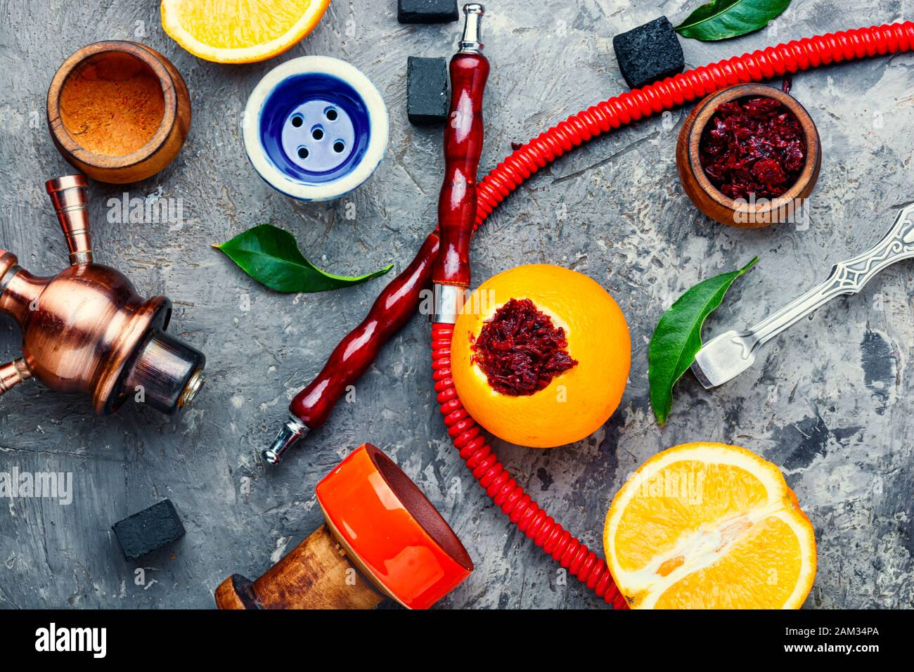 Details of tobacco hookah and tobacco with orange aroma.Fruit shisha ...