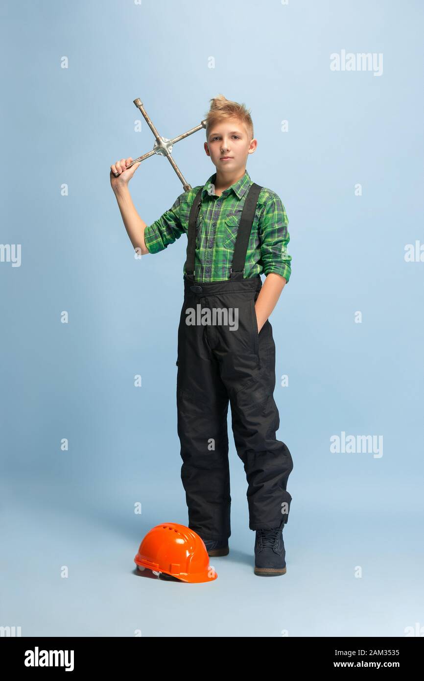 Happy to be. Boy dreaming about profession of engineer. Childhood ...