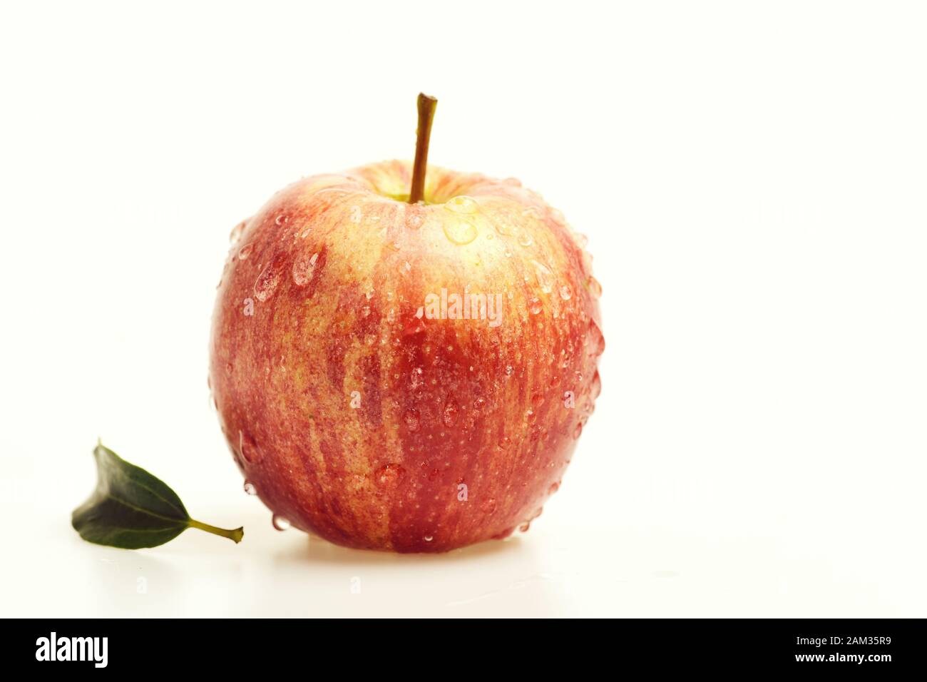 apple red color with water drops isolated on white background Stock ...