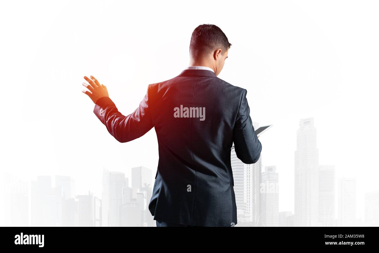 Back view of man in business suit and tie Stock Photo - Alamy