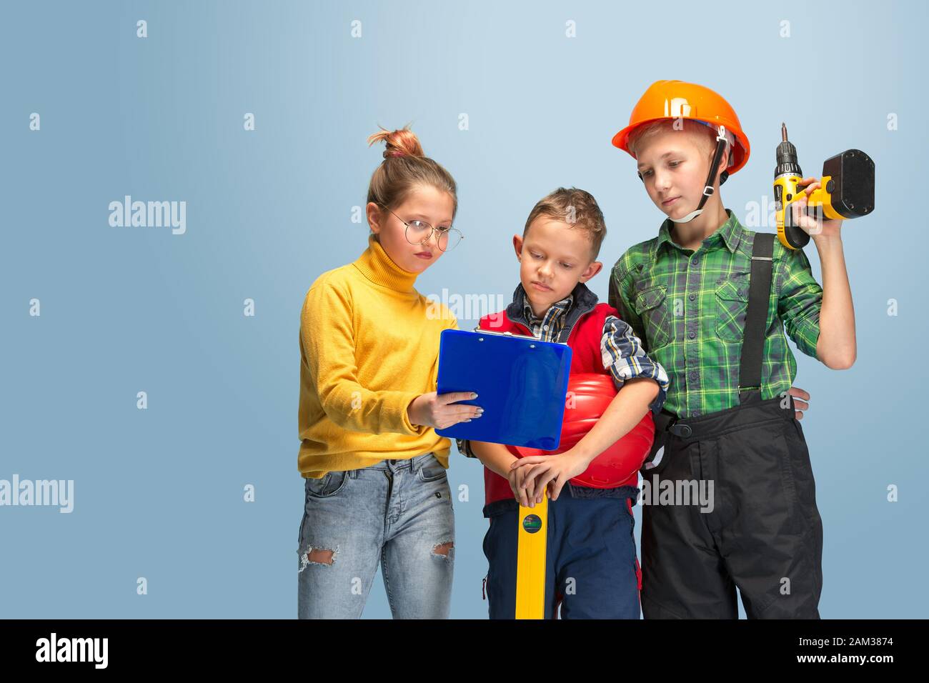 I build my dream. Kids dreaming about profession of engineer. Childhood ...