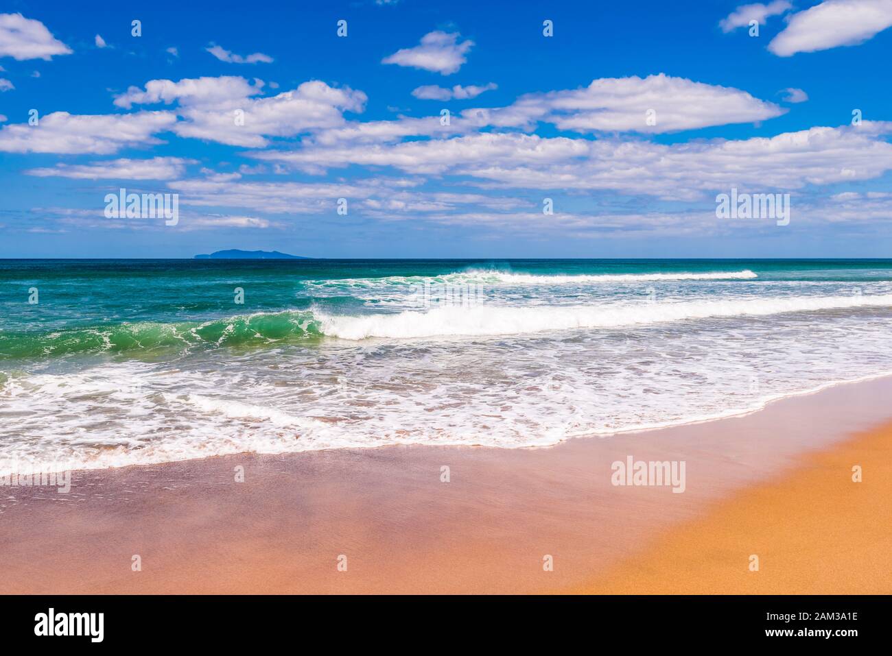 Waves and sand at Whiritoa Beach, Waikato, North Island, New Zealand ...
