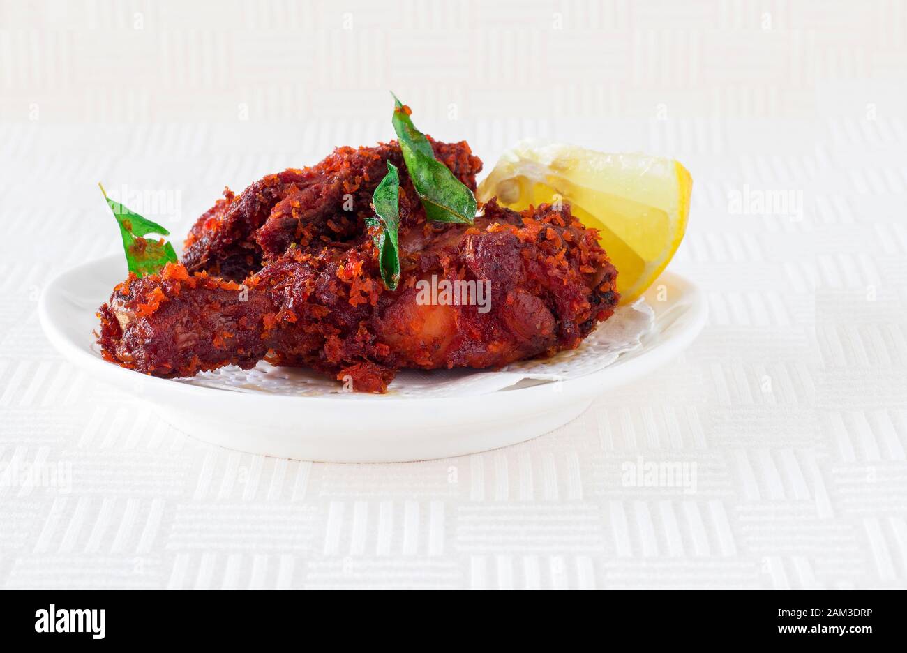 Authentic Indian Chicken fry with spices, curry leaf and coconut ...