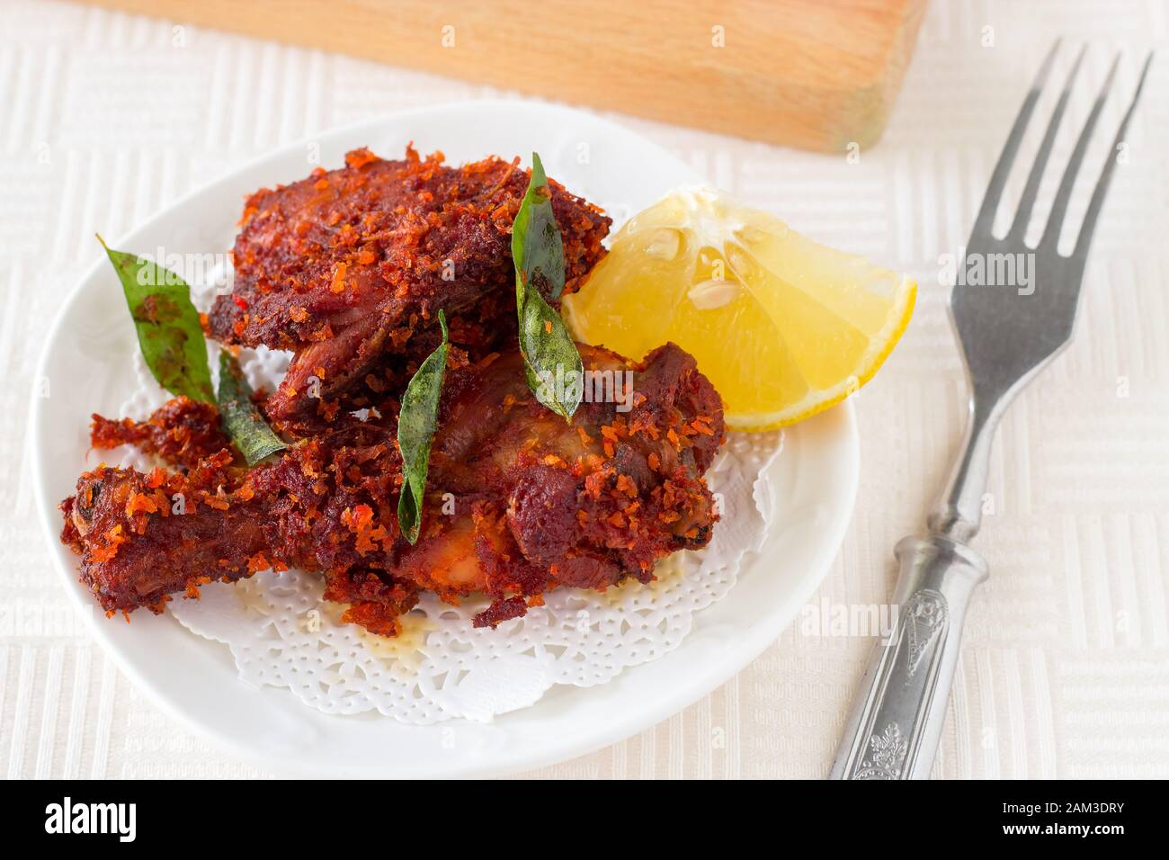 Authentic Indian Chicken fry with spices, curry leaf and coconut ...