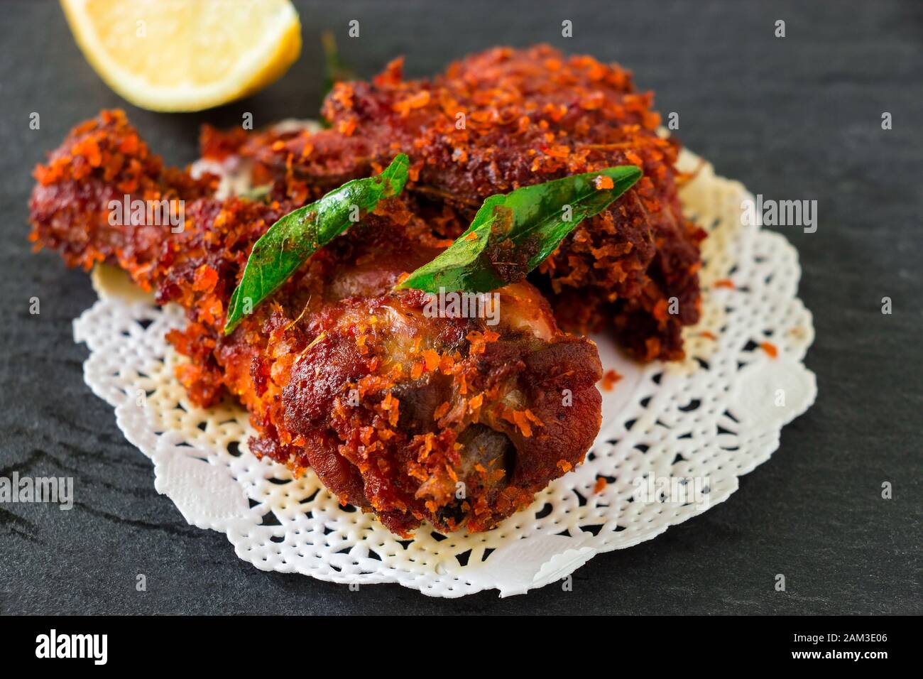 Authentic Indian Chicken fry with spices, curry leaf and coconut ...