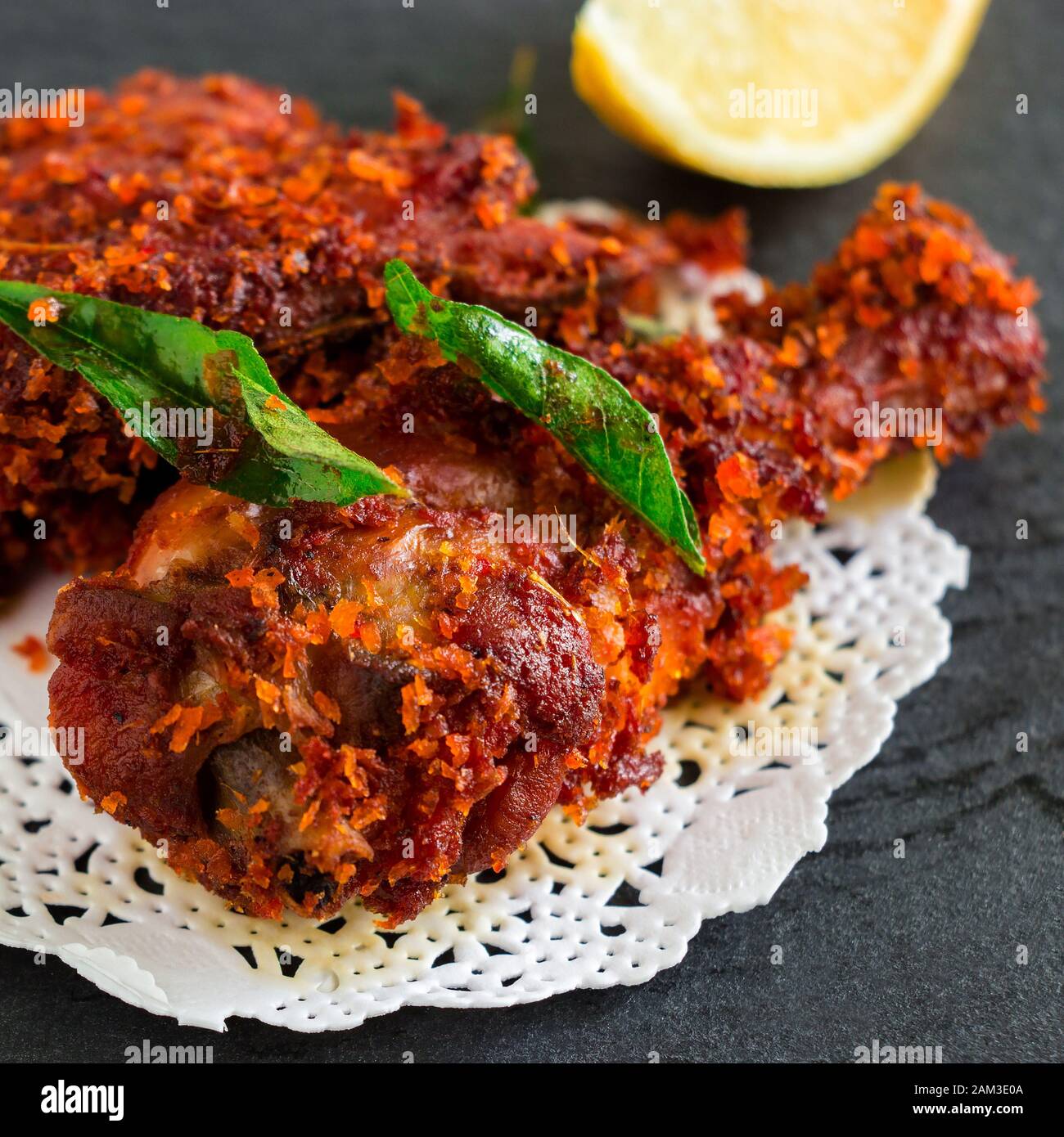 Authentic Indian Chicken fry with spices, curry leaf and coconut ...