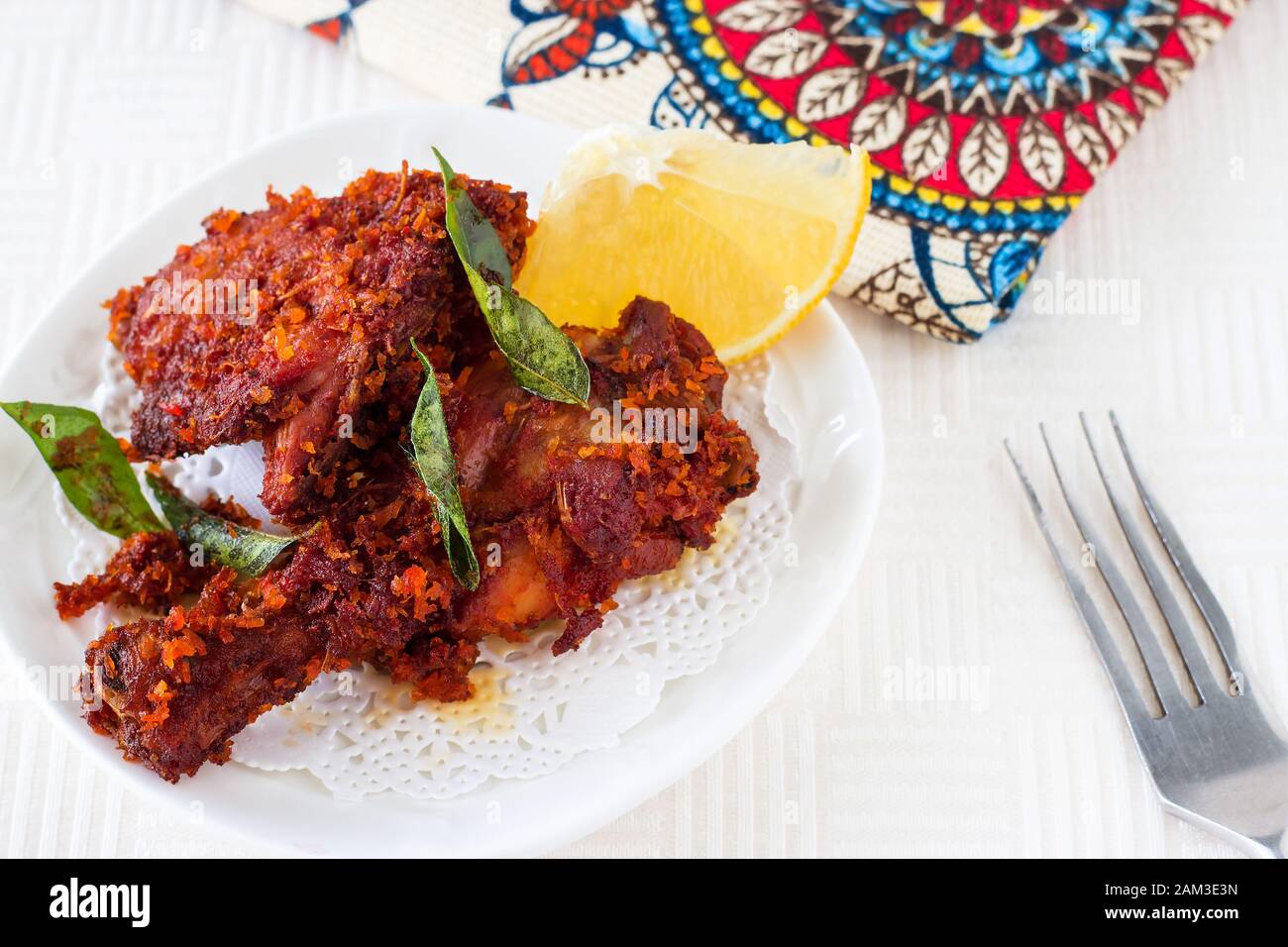 Authentic Indian Chicken fry with spices, curry leaf and coconut ...