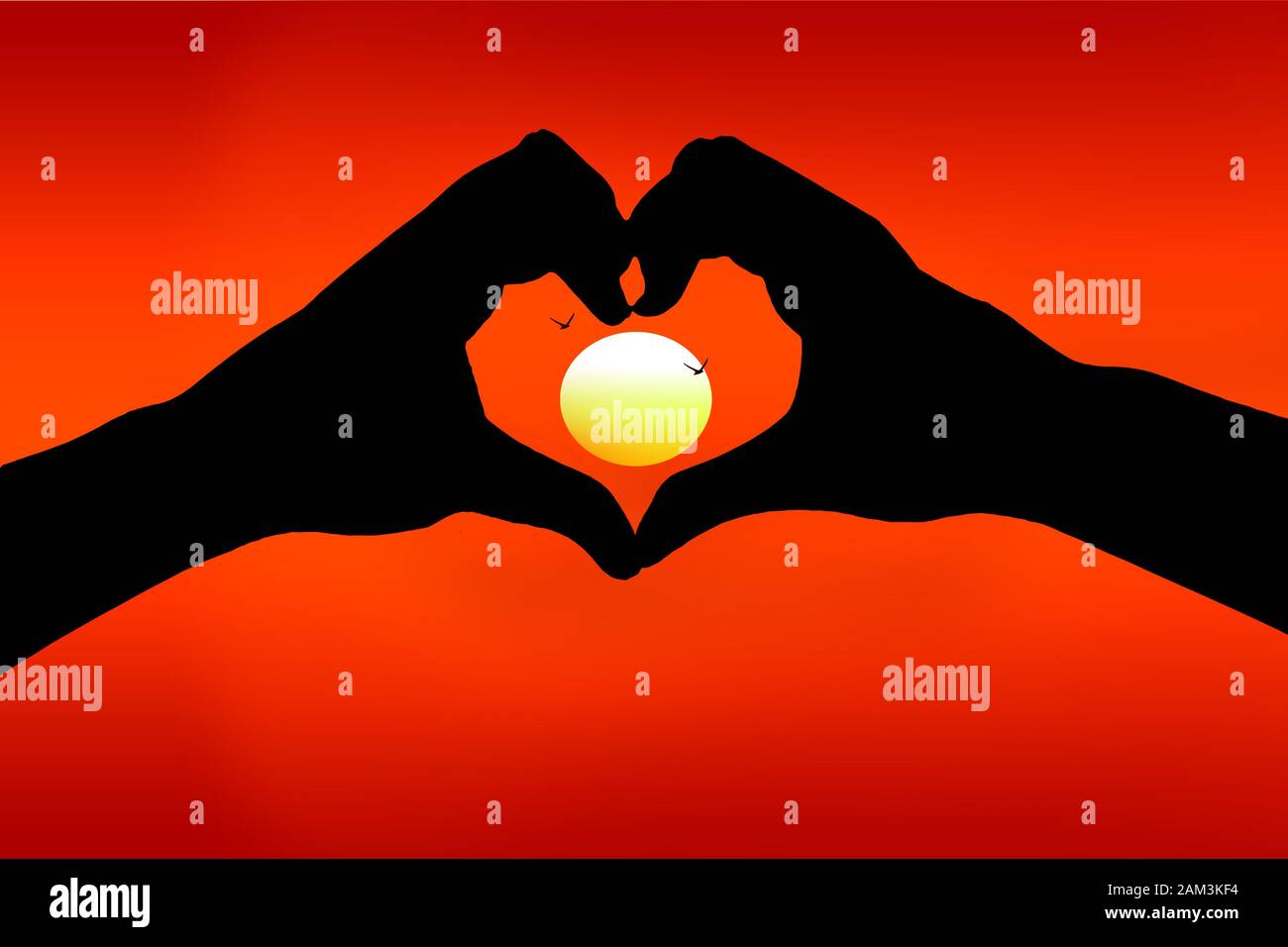 silhouette of two hands forming a heart with the setting sun in the ...