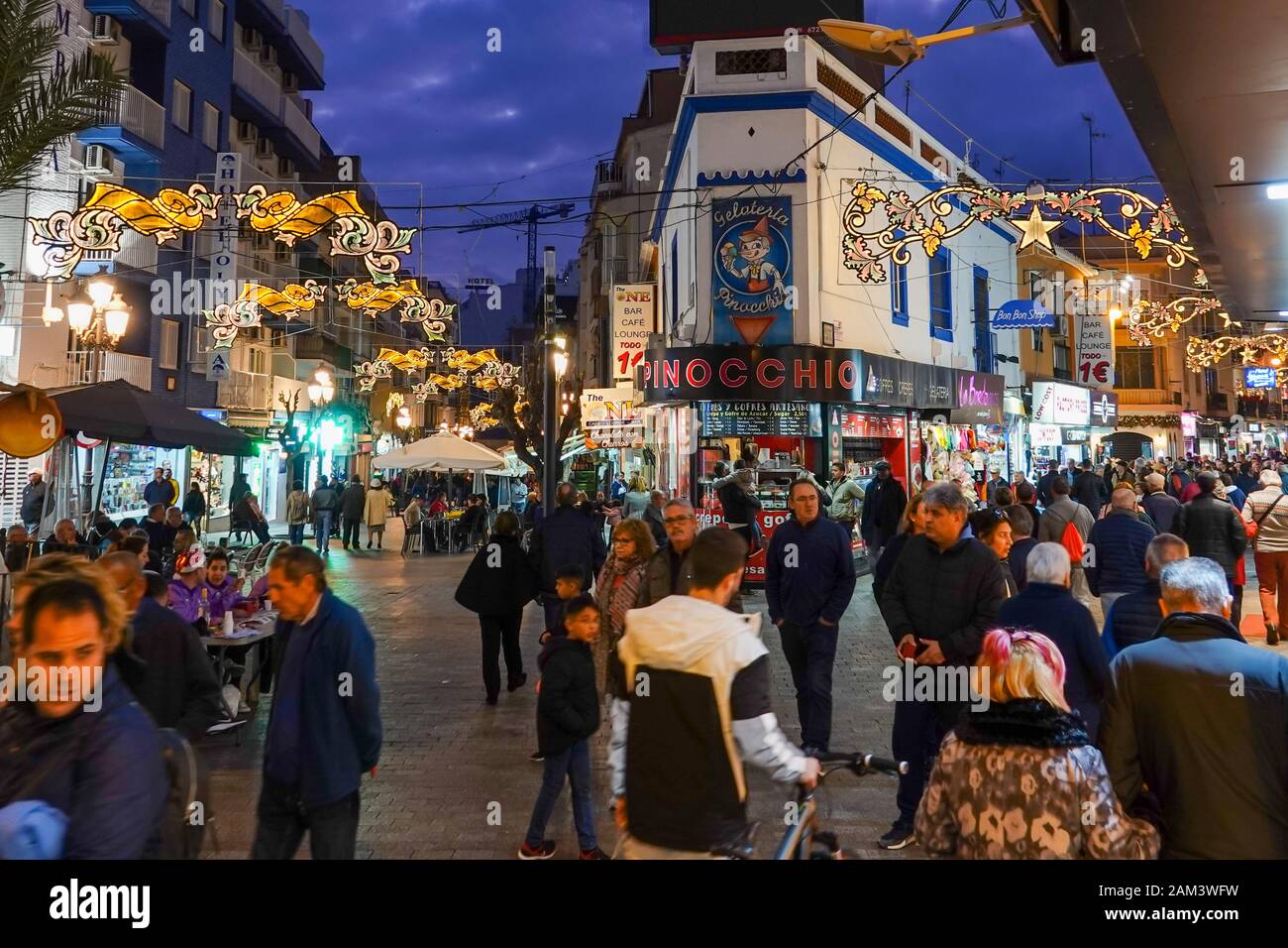 Benidorm Old Town busy pedestrianised streets with crowds of people and ...