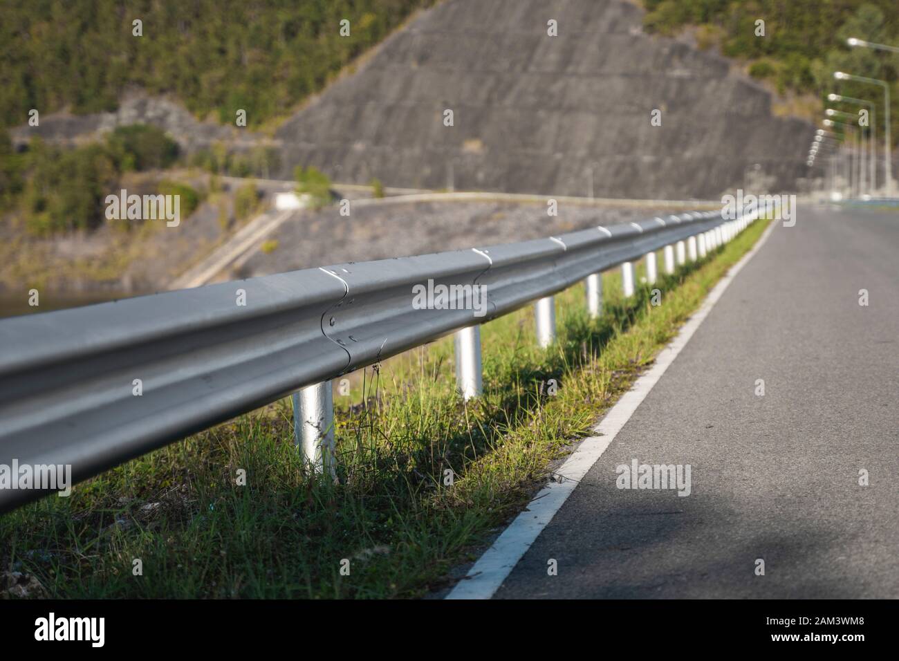 Safety steel barrier on freeway bridge designed to prevent the exit of ...