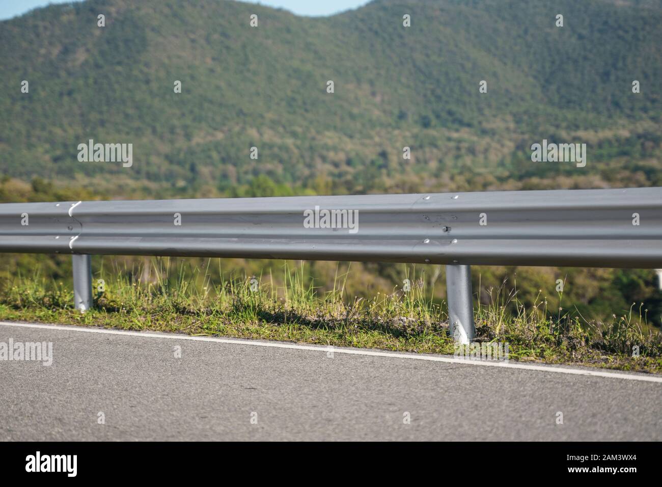 Safety steel barrier on freeway bridge designed to prevent the exit of ...