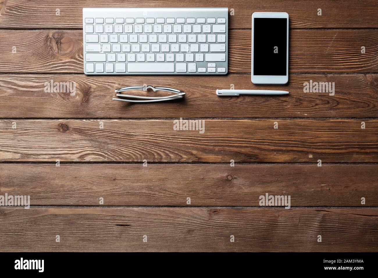 Top view of office workspace with gadgets Stock Photo - Alamy