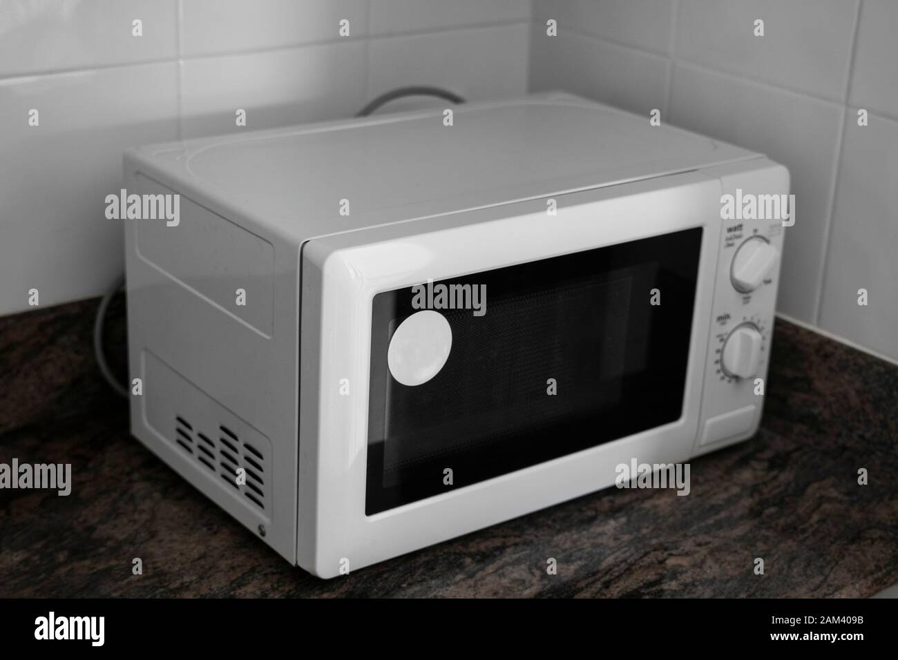 Woman microwave dish hi-res stock photography and images - Alamy