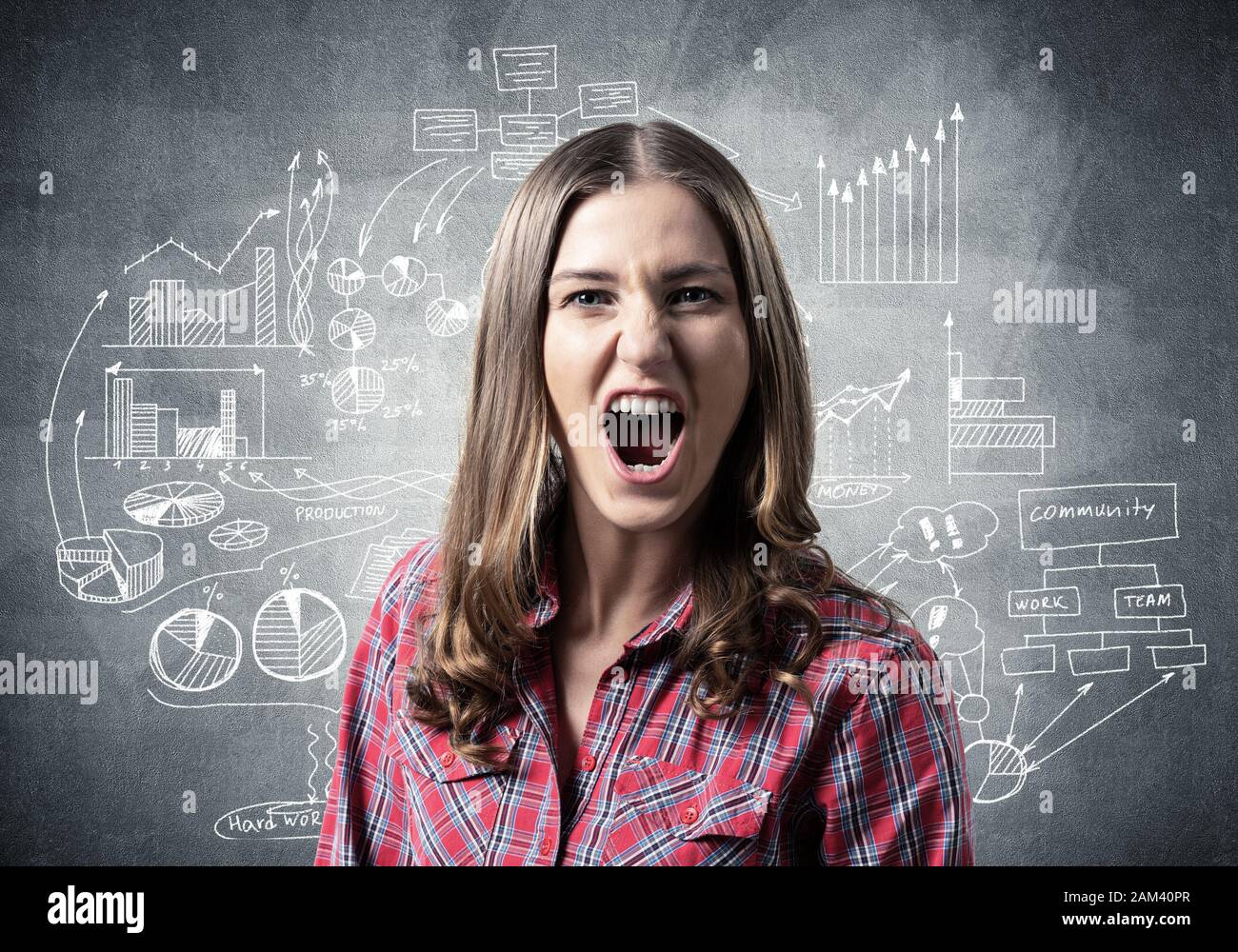 Frenzied young woman screaming with anger Stock Photo - Alamy