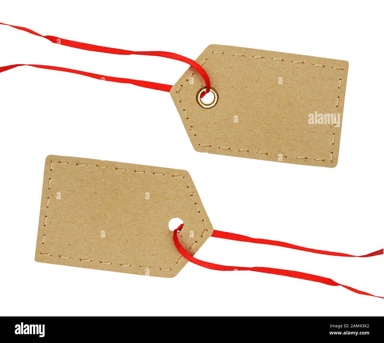 Cardboard labels on red ribbon isolated on white Stock Photo - Alamy