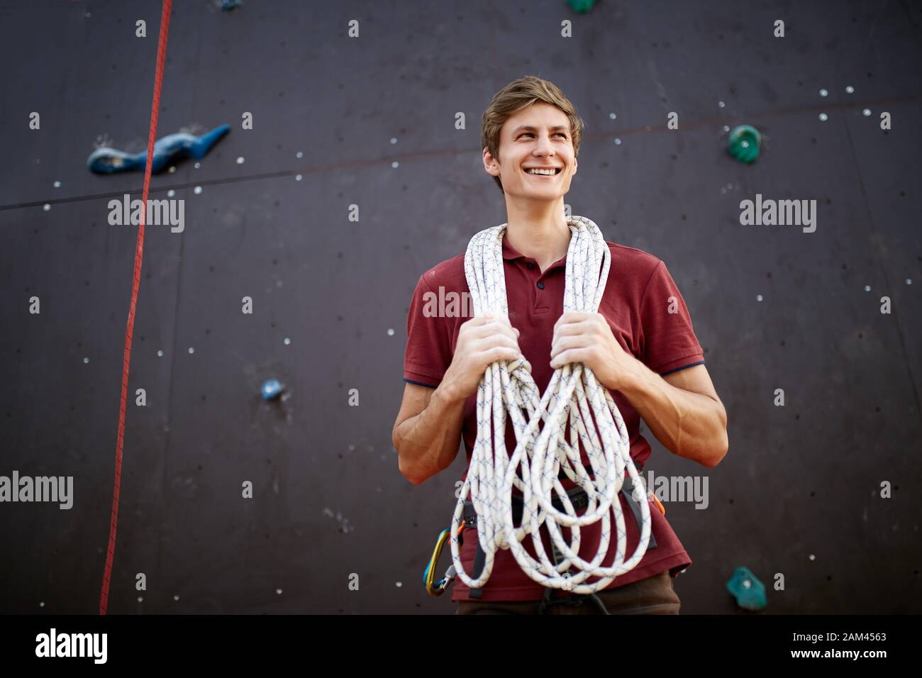 Handsome young man bouldering hi-res stock photography and images - Alamy
