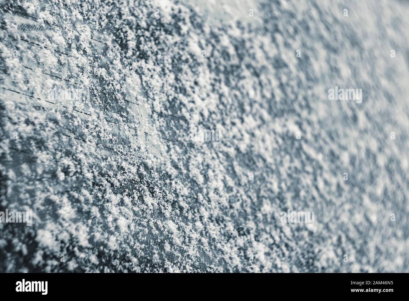 White snowflakes on winter blurry hi-res stock photography and images ...