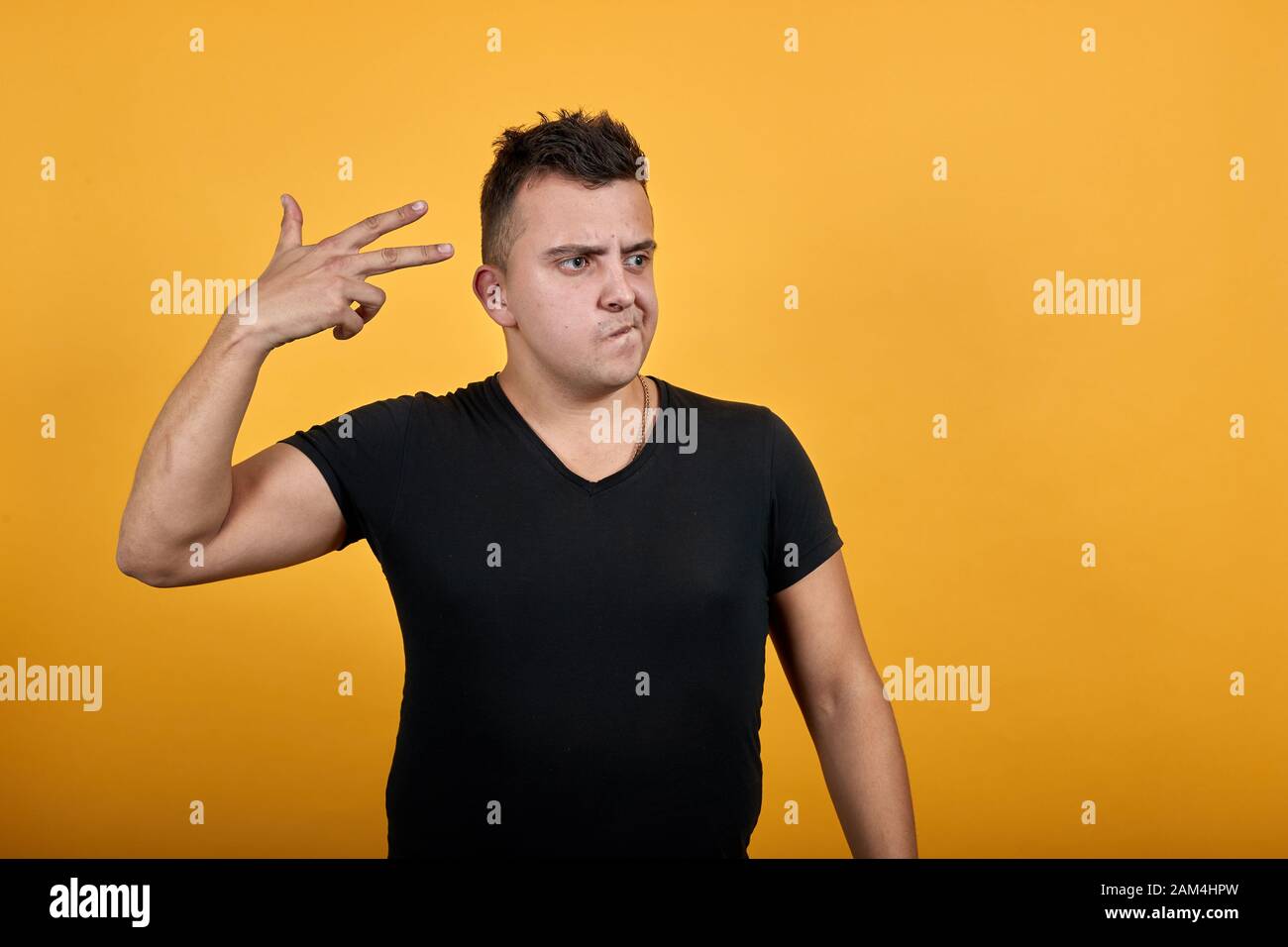 Man smile gun to head hi-res stock photography and images - Alamy