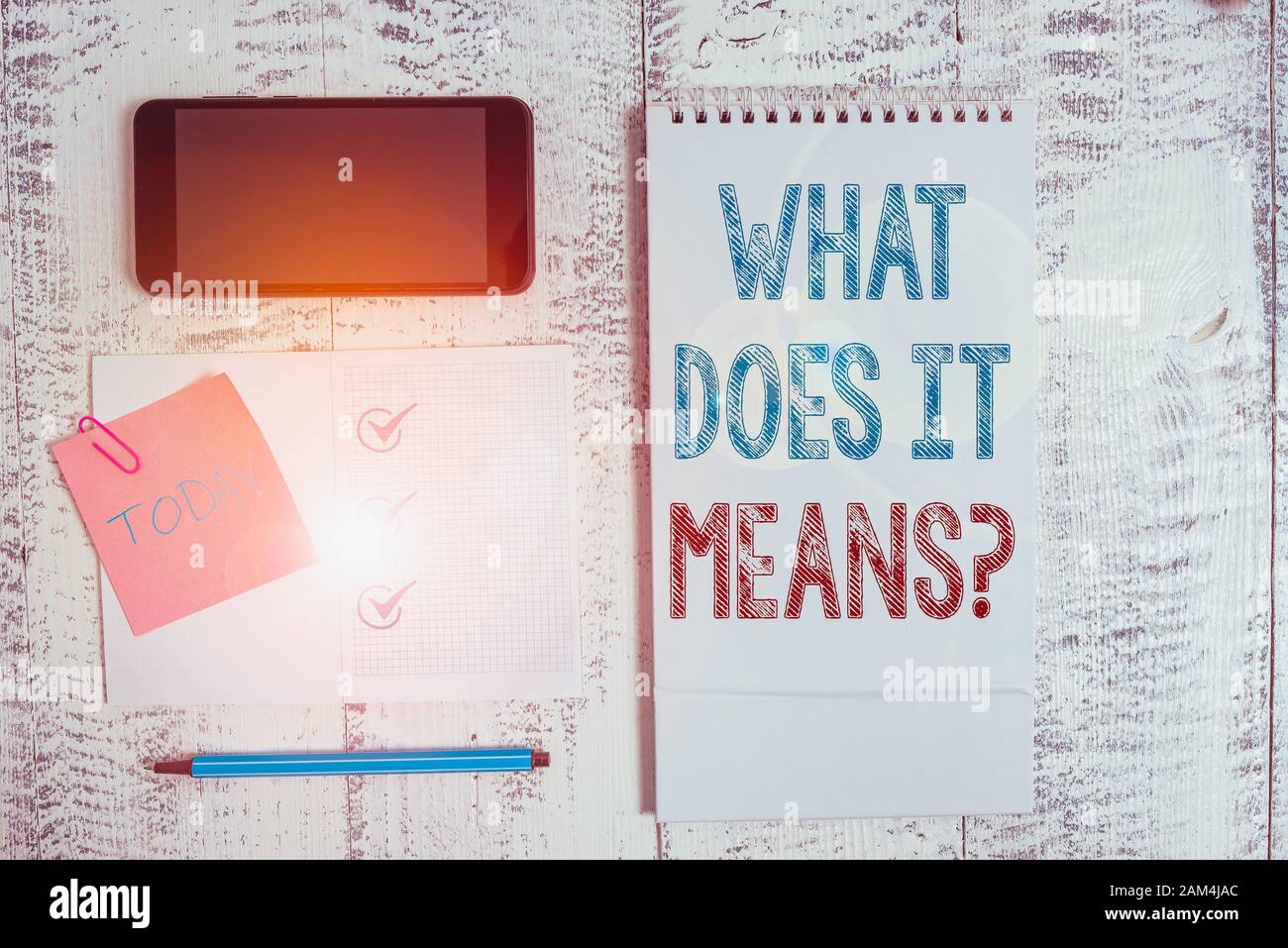 Writing note showing What Does It Means Question. Business concept for ...